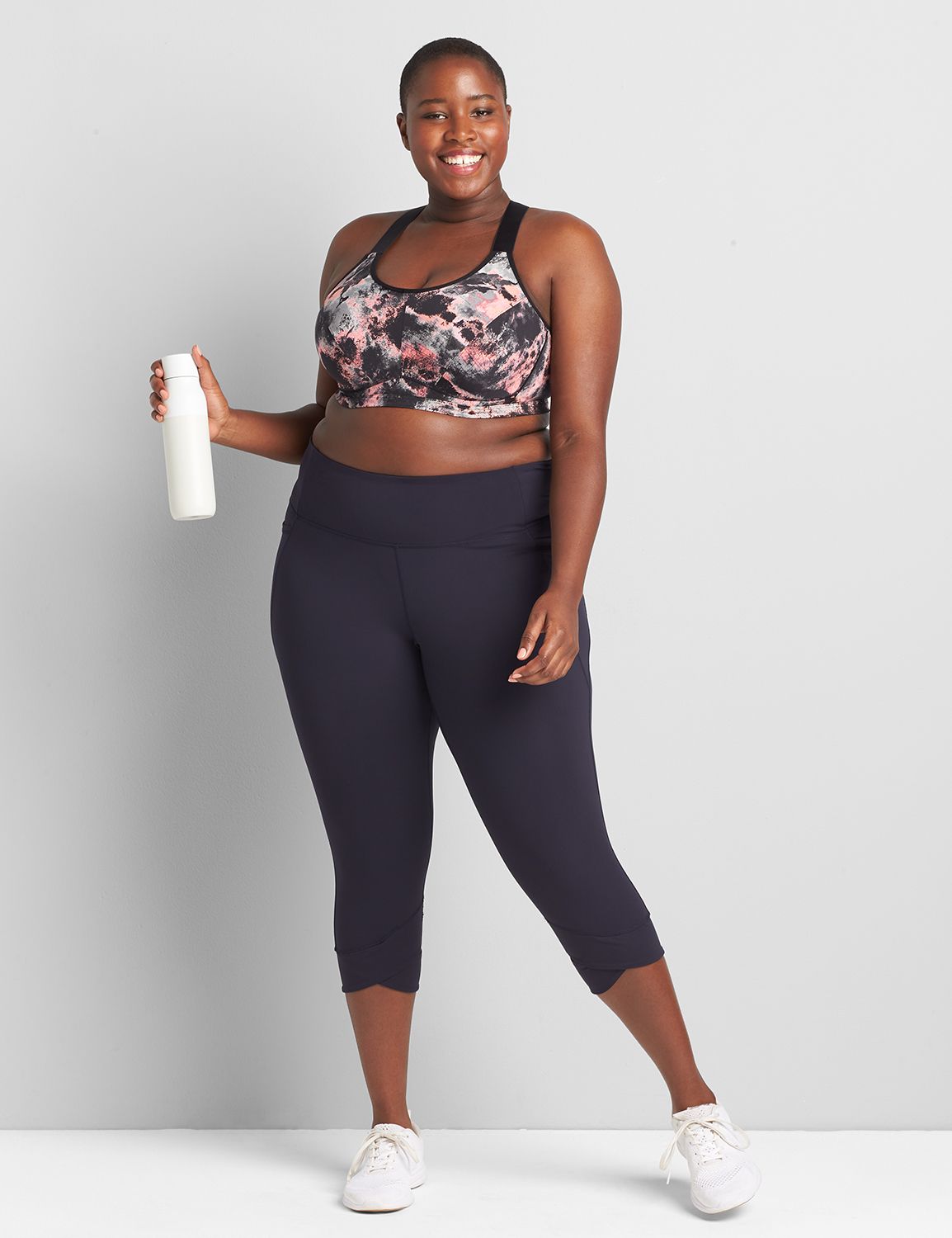 LIVI High-Rise Soft Capri Legging with Pockets - Hem Detail